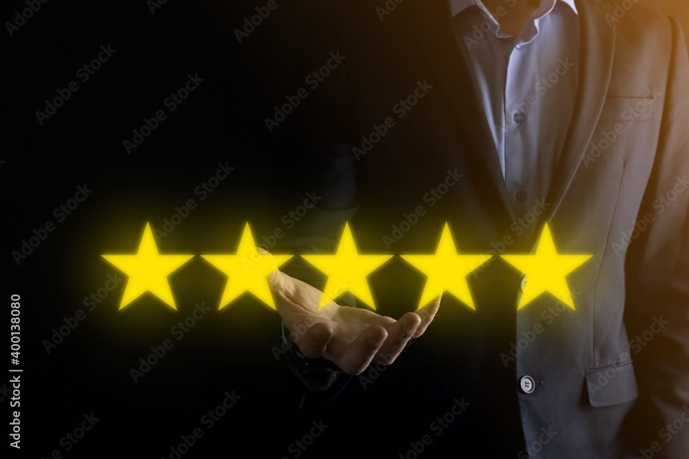 Man hand showing on five star excellent rating.pointing five star ...