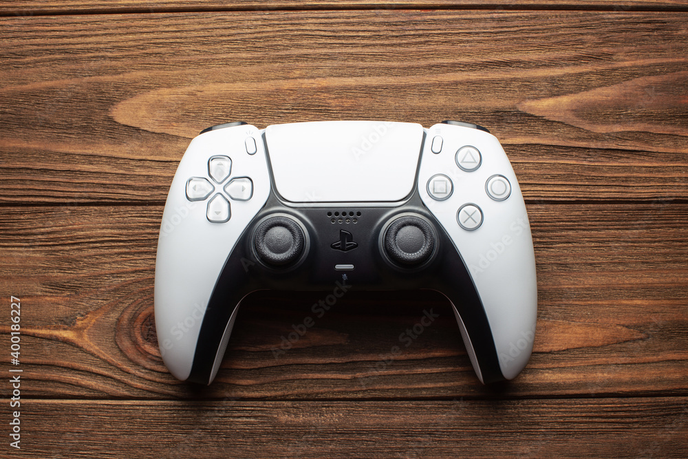Dualsense ps5 controller on wooden background, gaming concept Stock ...