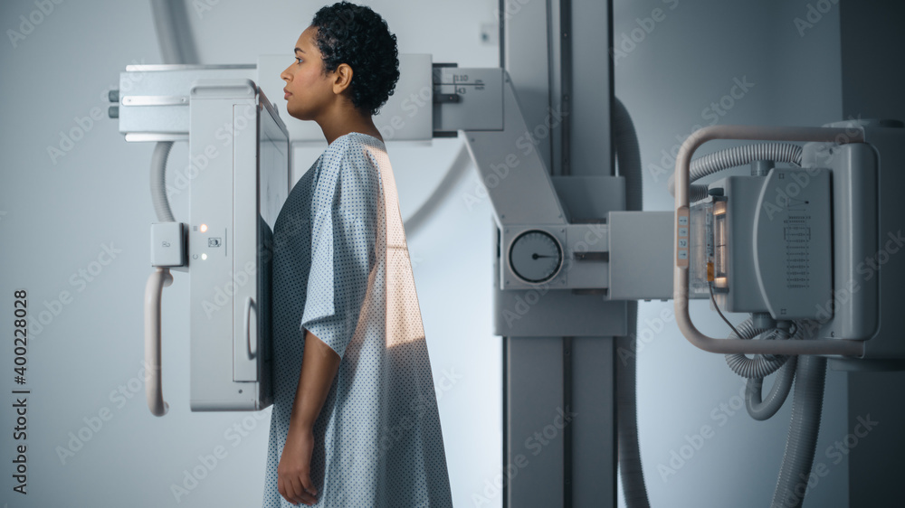 Hospital Radiology Room: Beautiful Latin Woman Standing Next to X-Ray ...