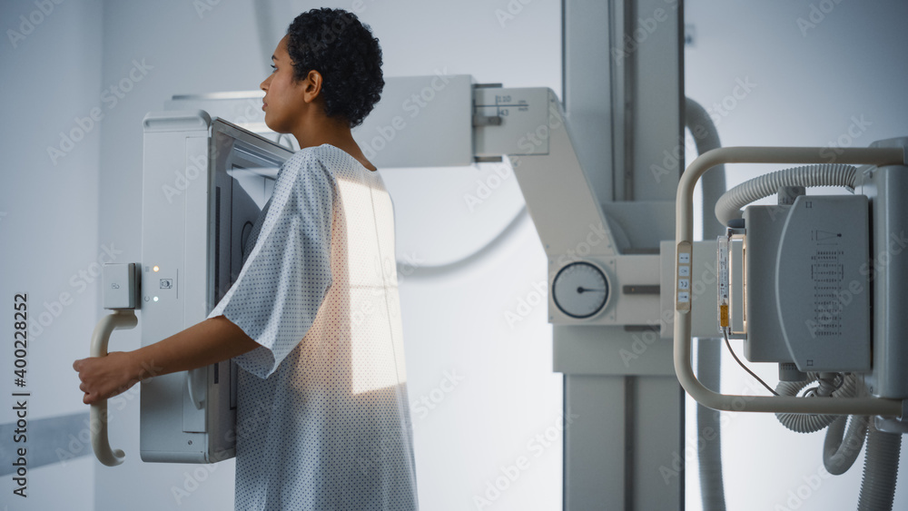 Hospital Radiology Room: Beautiful Latin Woman Standing Next to X-Ray ...