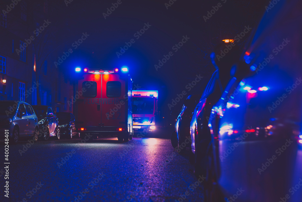 Ambulance at night, blue light, fire department, berlin, germany, out ...