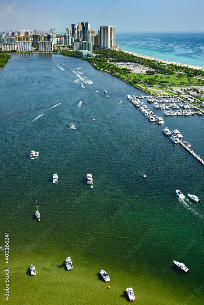 USA, Florida, Miami, Aerial view of bay of water and city buildings ...