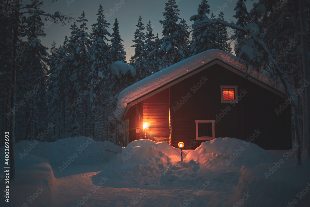 A night view of cozy wooden scandinavian cabin cottage chalet house ...