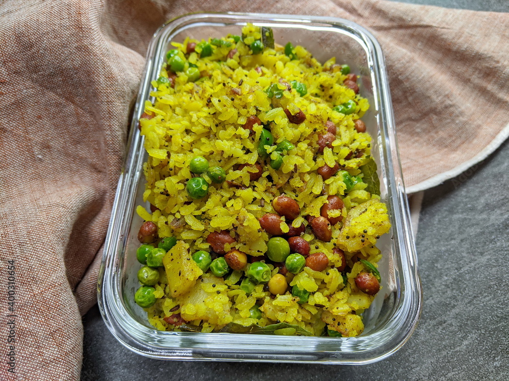 Kanda Batata Poha, a spicy, tangy Maharashtrian Breakfast made of ...