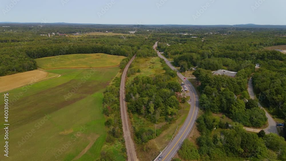 Madbury town center aerial view at Knox Marsh Road and railroad with ...