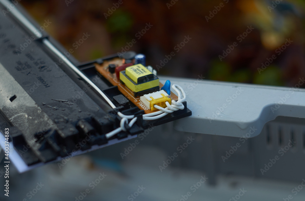 parts of a broken scanner in a landfill Stock Photo | Adobe Stock