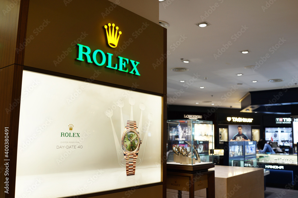 Shop window of a Rolex store in Changi Airport, Singapore. Rolex SA is ...