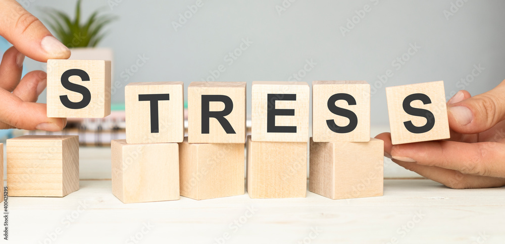 Stress - word from wooden blocks with letters, great worry caused by a ...