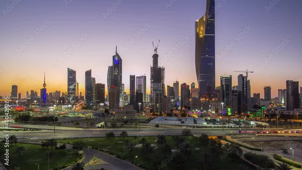 Skyline with Skyscrapers day to night transition timelapse in Kuwait ...