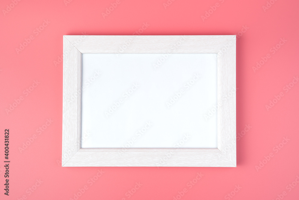 White frame with space to copy, on a pink background. The concept of ...