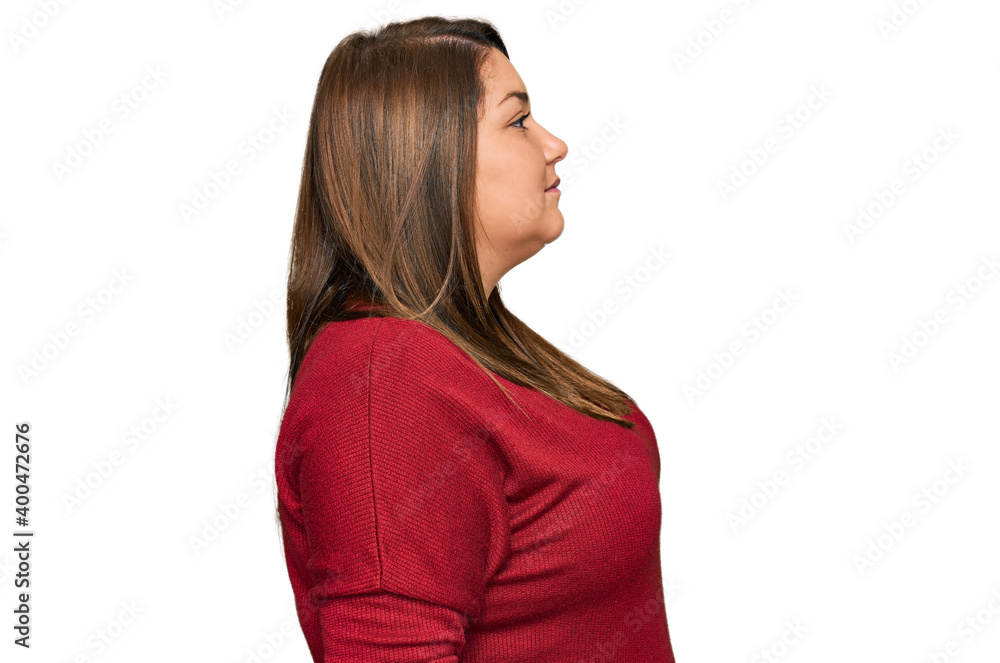 Beautiful brunette plus size woman wearing casual clothes looking to ...