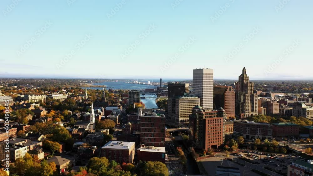 Aerial fly over above the high rise buildings following the Moshassuck ...