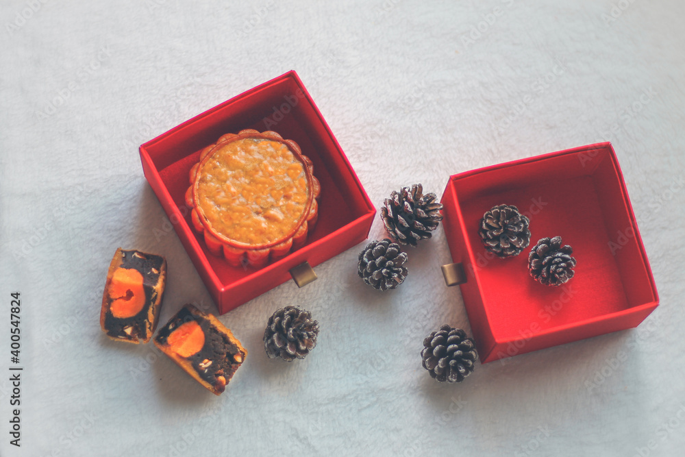Traditional moon cakes in a red box for the Moon Cake Festival or Mid ...