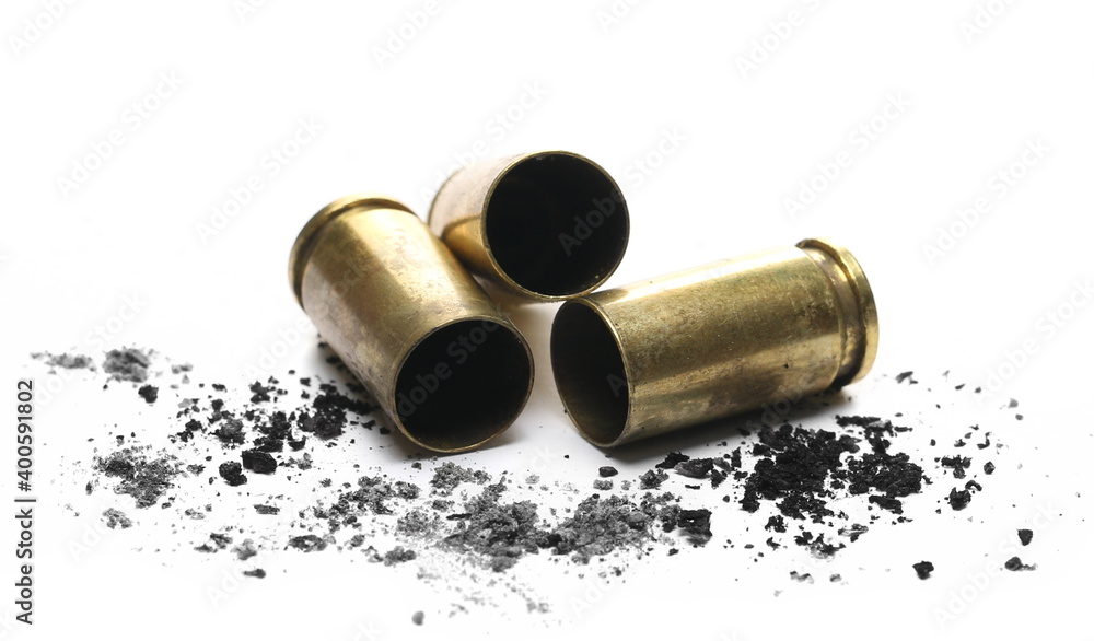 9mm pistol bullet casings with gunpowder pile isolated on white ...