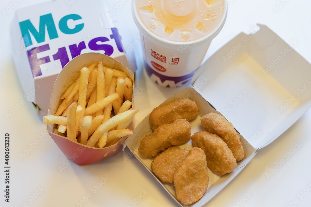 Happy Meal menu at McDonald's restaurant. Happy Meal Kids Next to ...