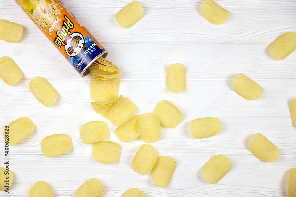 Pringles paprika flavour. Cardboard tube can with Pringles potato chips ...