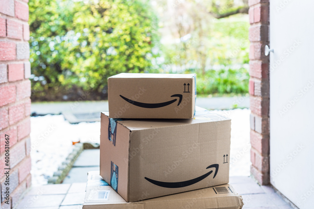 Amazon prime parcel delivery carboard boxes left in front of the main ...