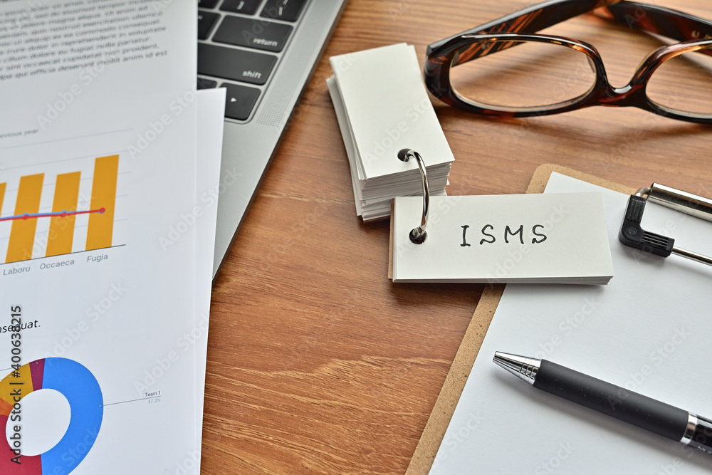 There is a piece of paper with a graph printed on it, a clipboard, and ...