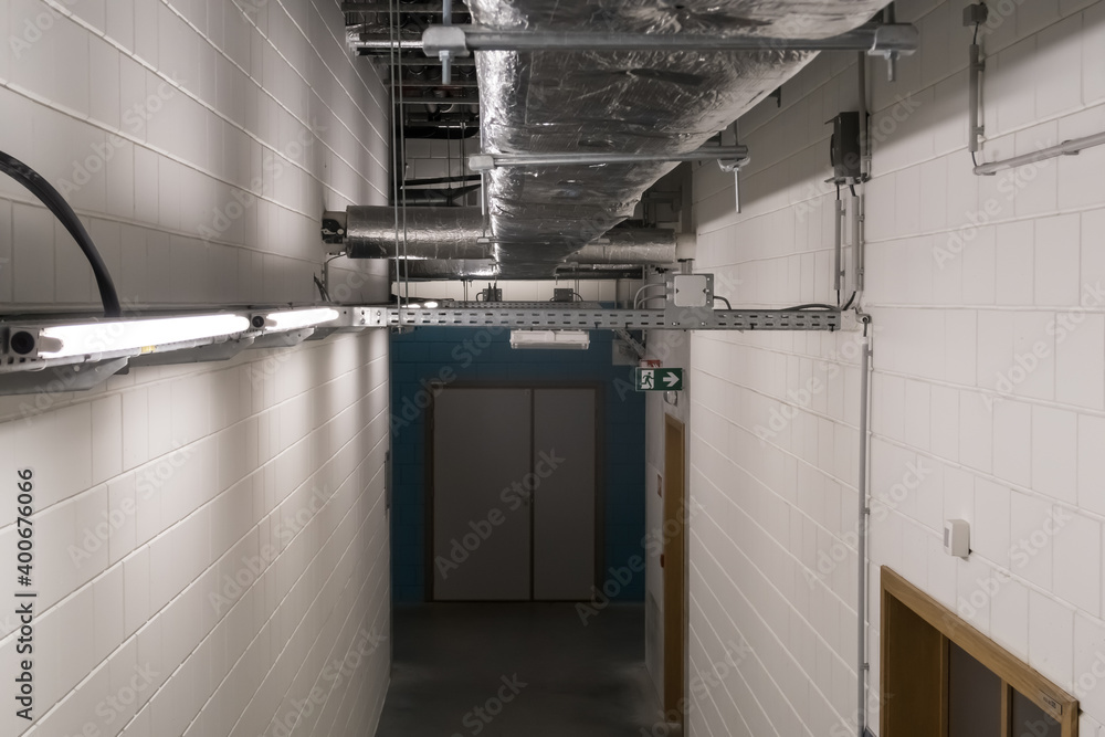 electrical cables hang from the ceiling in a cable duct Stock Photo ...
