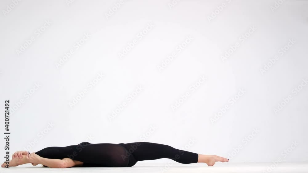 Blonde bent female jazz dancer performance with arms swinging in s ...