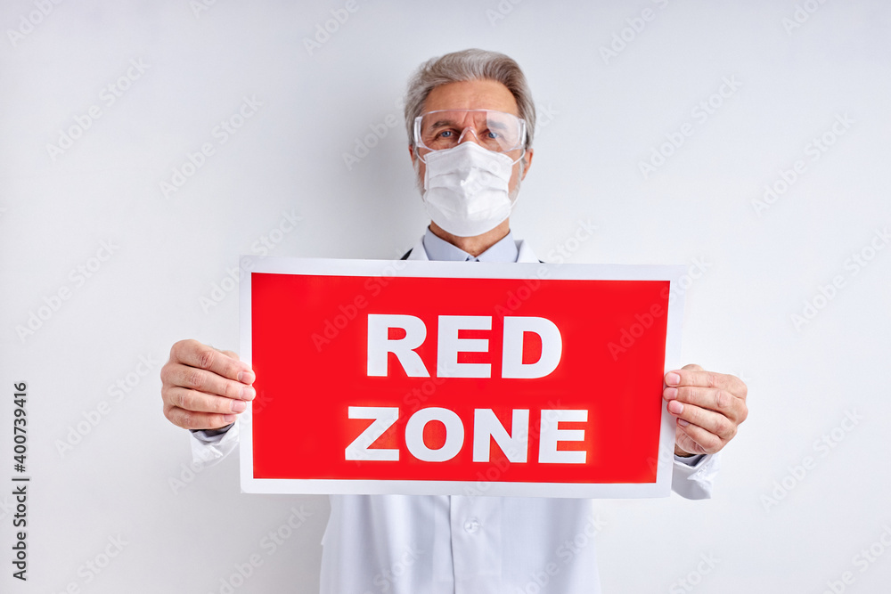 written text red zone and doctor man in a white hazmat suit isolated ...