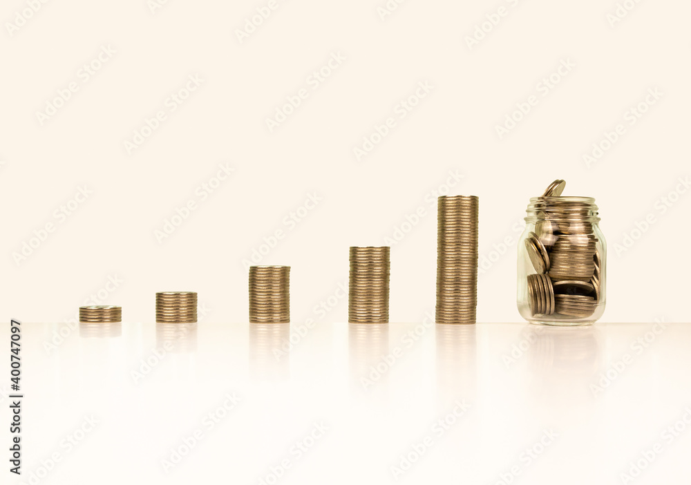 Stack of increasing coins and its reflection on bright background Stock ...