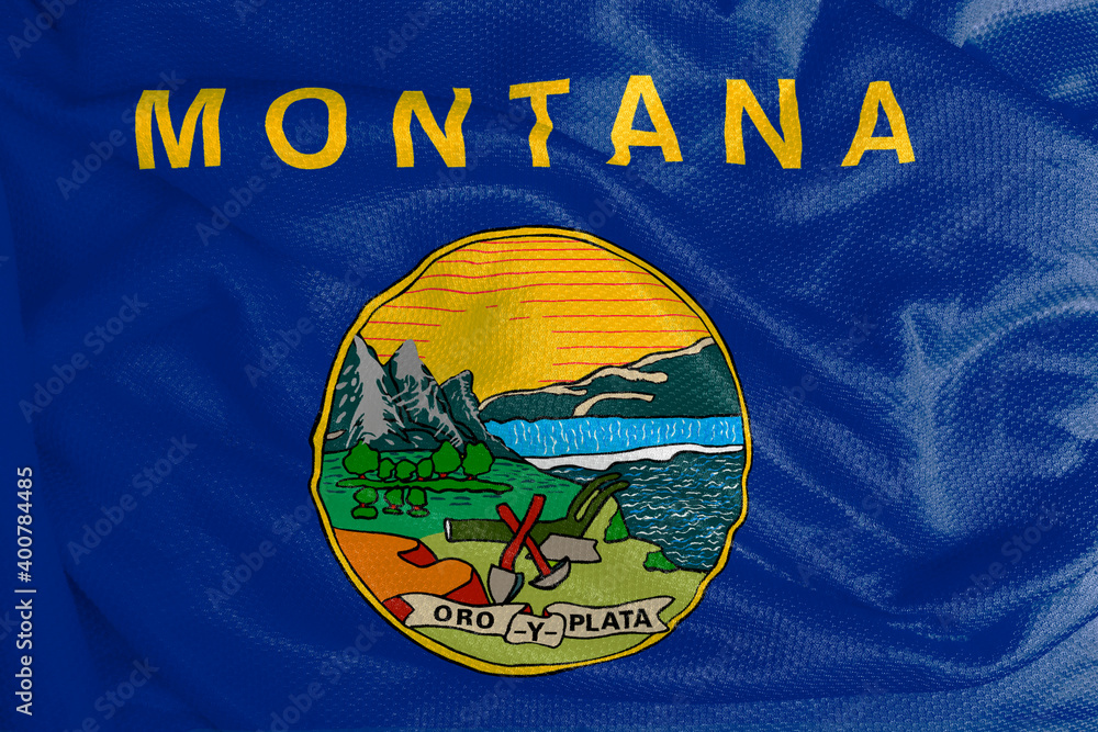 The Montana flag is a flag with the seal of Montana in the center of a ...