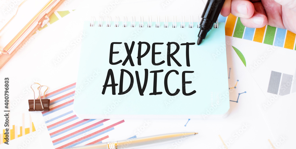 Businessman hand,paper plate,marker, diagram,chart and office tools ...