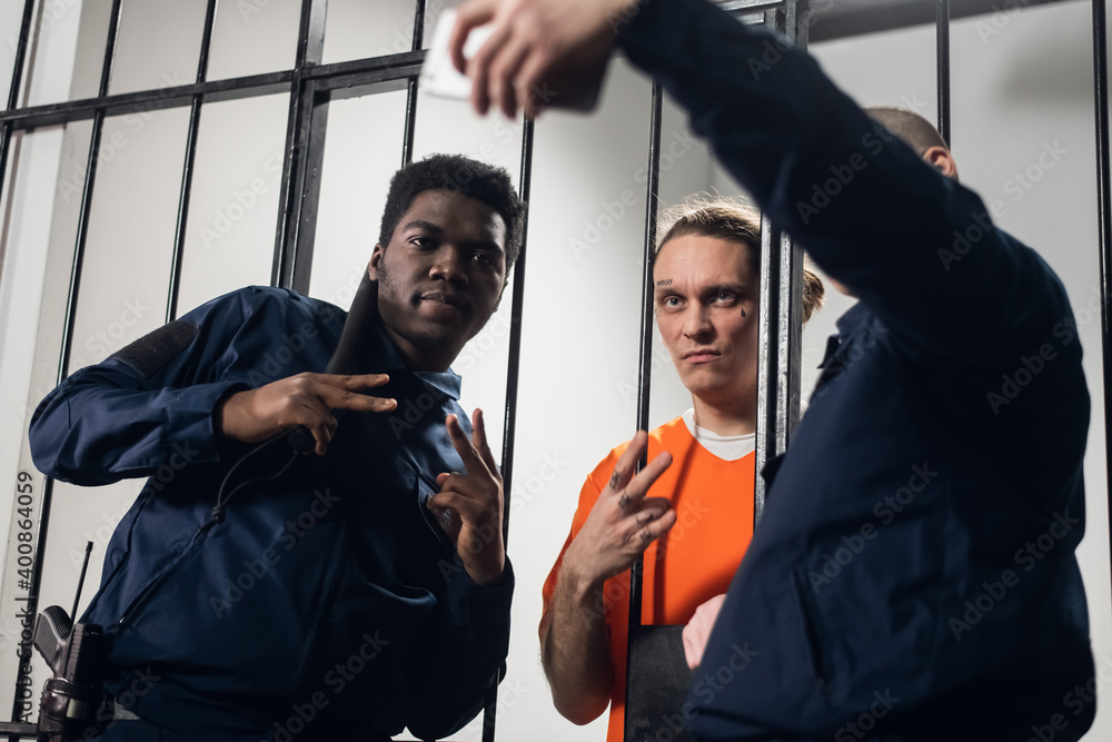 Actors on the set of a movie about prison make a funny selfie in a ...