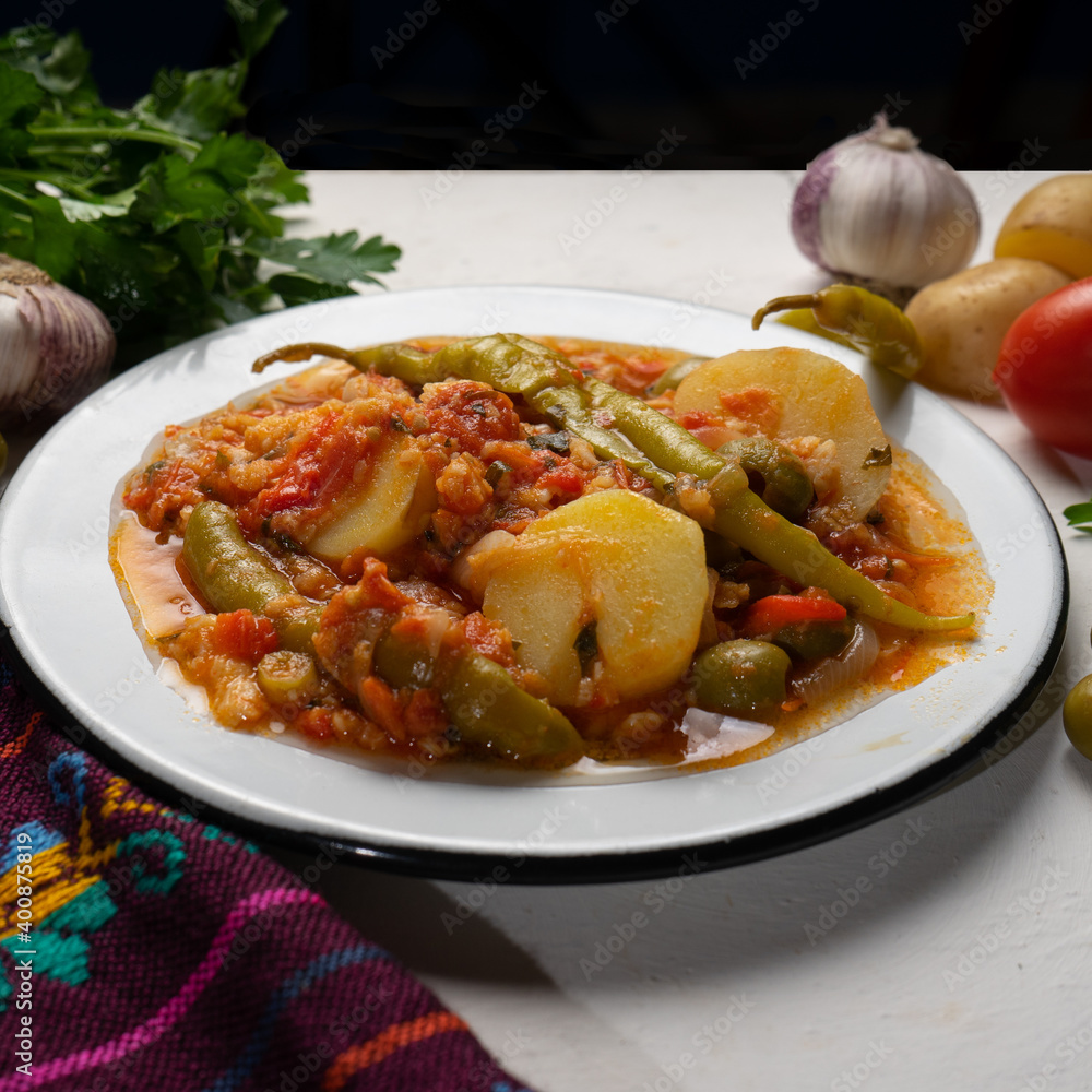 Mexican style cod called a la vizcaina on white background Stock Photo ...