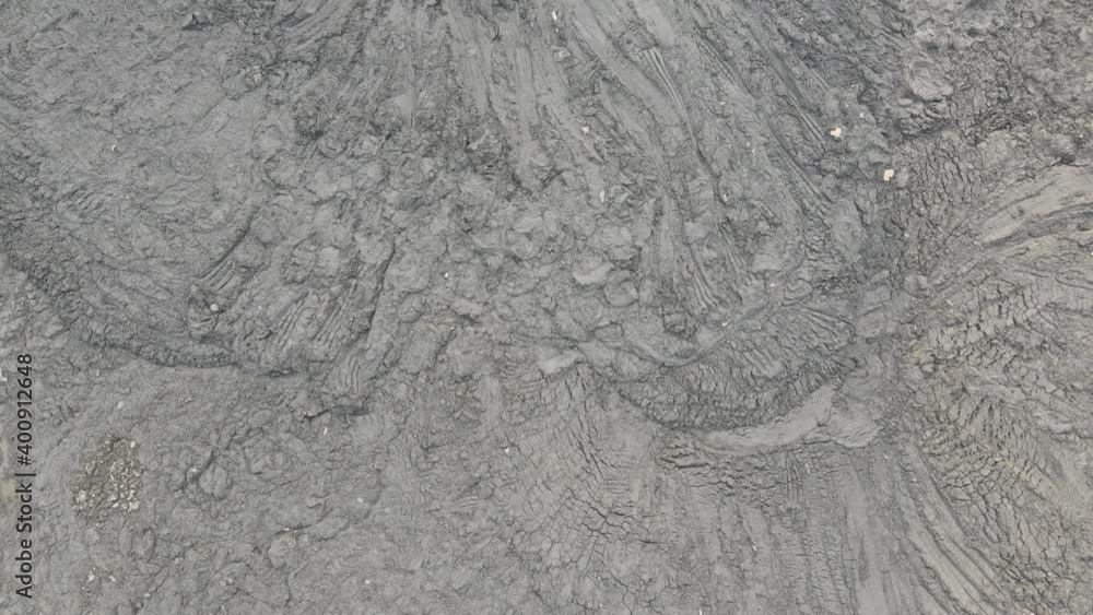 Drone aerial view of mud dirt ground in construction site in foggy day ...