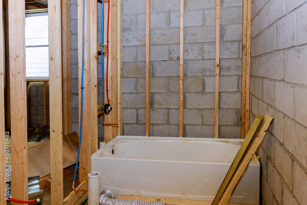 Bathroom showing plumbing work connecting installation of pipes with ...