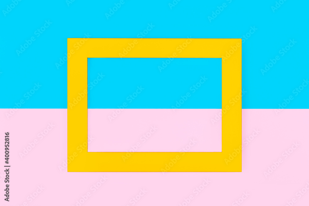 Simple yellow frame on pastel pink and blue background. Minimal border ...
