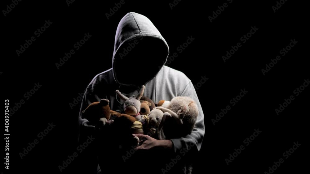 The psychopath rocks mascots. Silhouette of a man with a darkened face ...