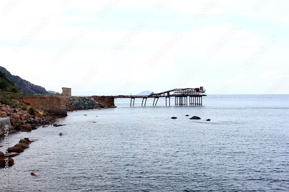 Rusty iron overpass in Rio Marina, Elba Island, Tuscany Stock Photo ...