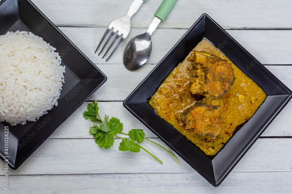 Bengali cuisine - doi katla (catla fish curry with yogurt) in a plate ...