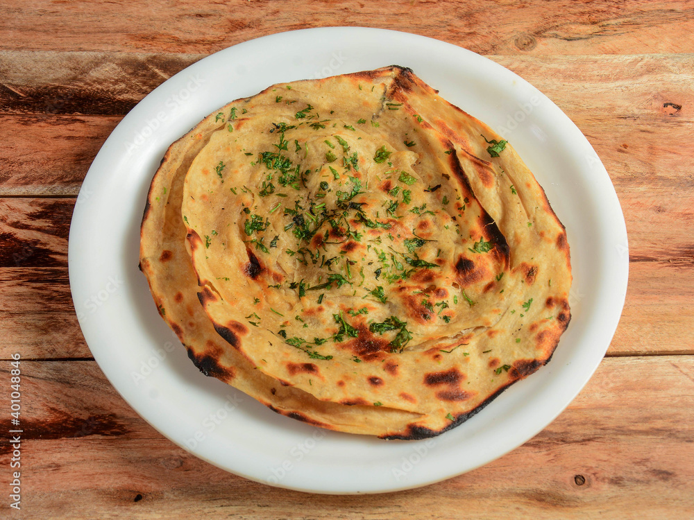 Lachha Paratha, a layered flat bread using wheat flour, popular dish in ...