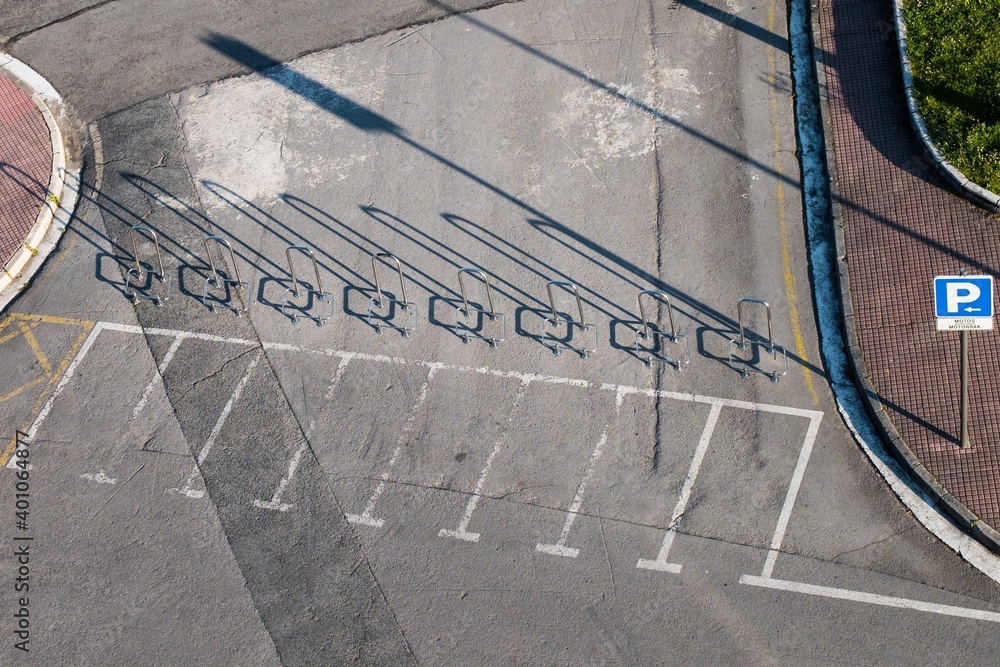 Parking lots for motorbikes and bicycle rack. Parking sign - the ...