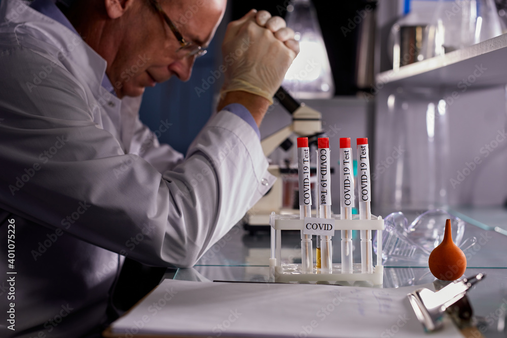 exhausted man scientist,crashing, with failed experiments and working ...