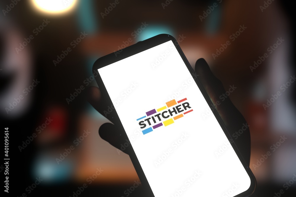 Logo of podcast distribution platform Stitcher displayed on smartphone ...