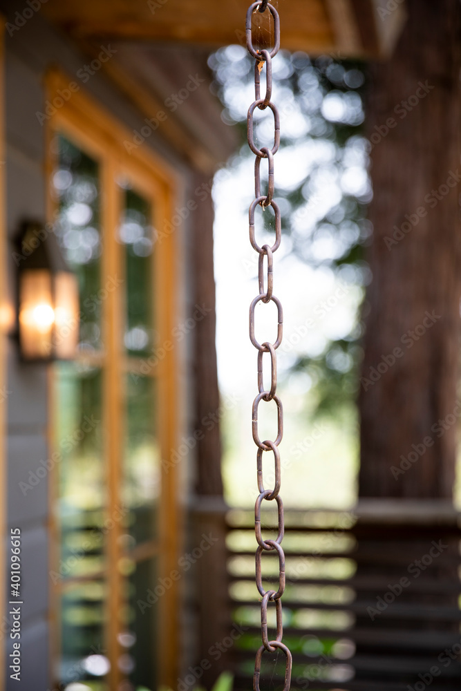 Japanese style chain downspout outside a cabin in Northern California ...