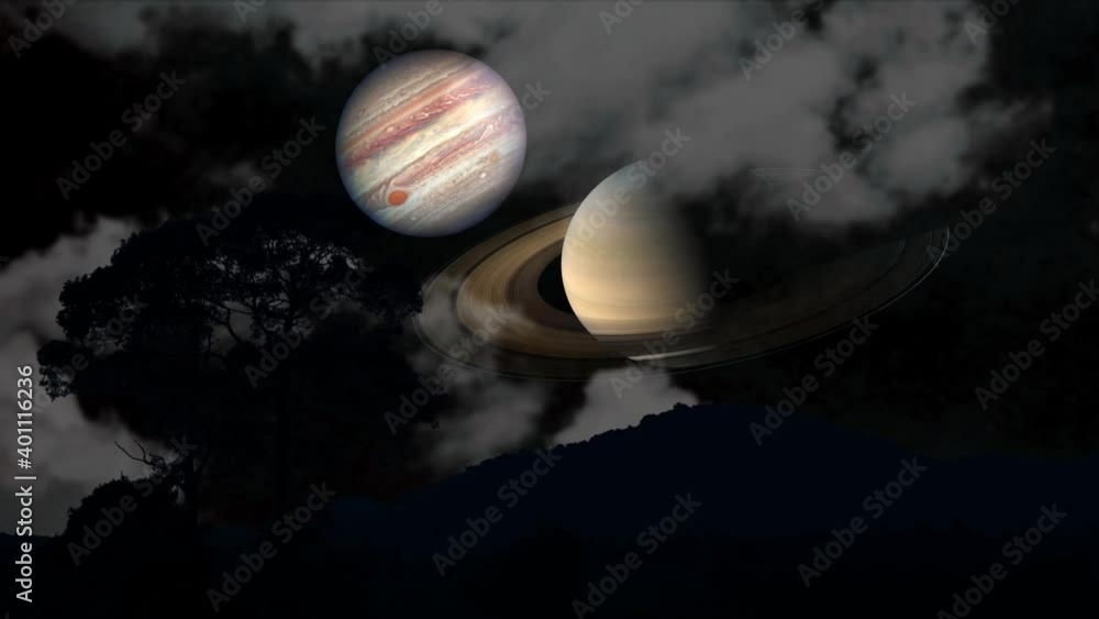 Saturn and Jupiter rise back silhouette mountain on the night sky ...