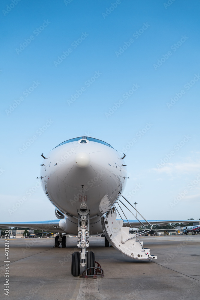 luxury private jet - front view, the onboard stairs is already extended ...
