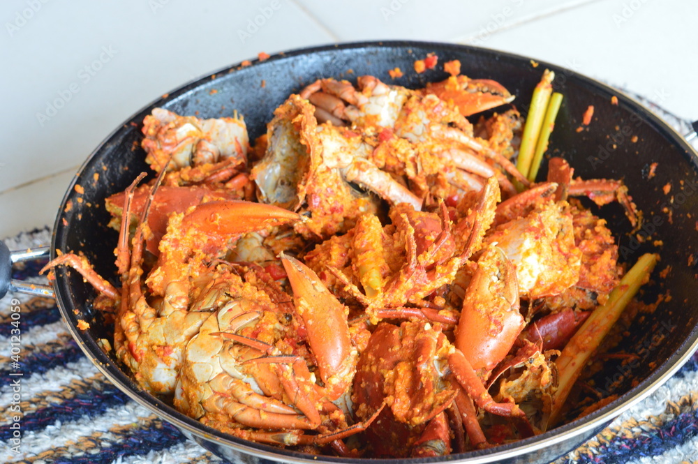 Kepiting rebus segar saus sambal - Crab stew in tomato sauce Stock ...