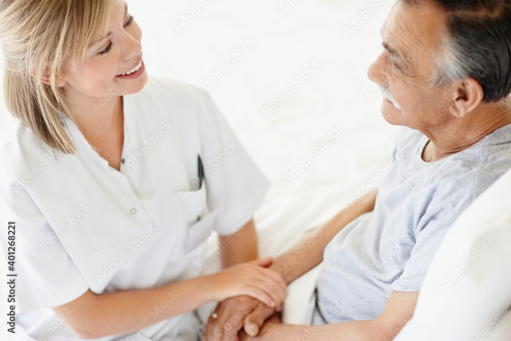 Nurse sitting with patient Stock Photo | Adobe Stock