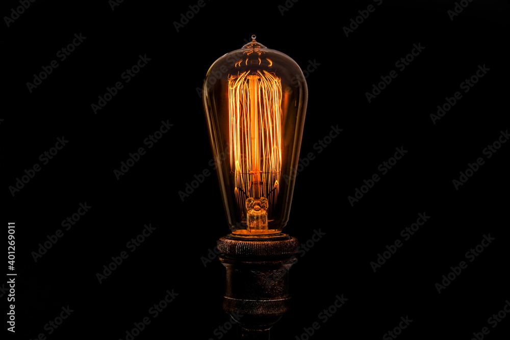 Edison light bulb on black background Stock Photo | Adobe Stock