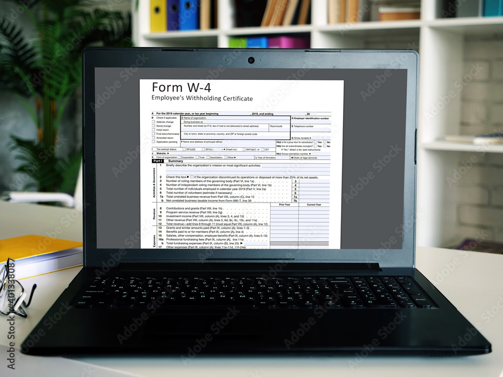 Form W-4 Employee's Withholding Certificate sign on the sheet. Stock ...