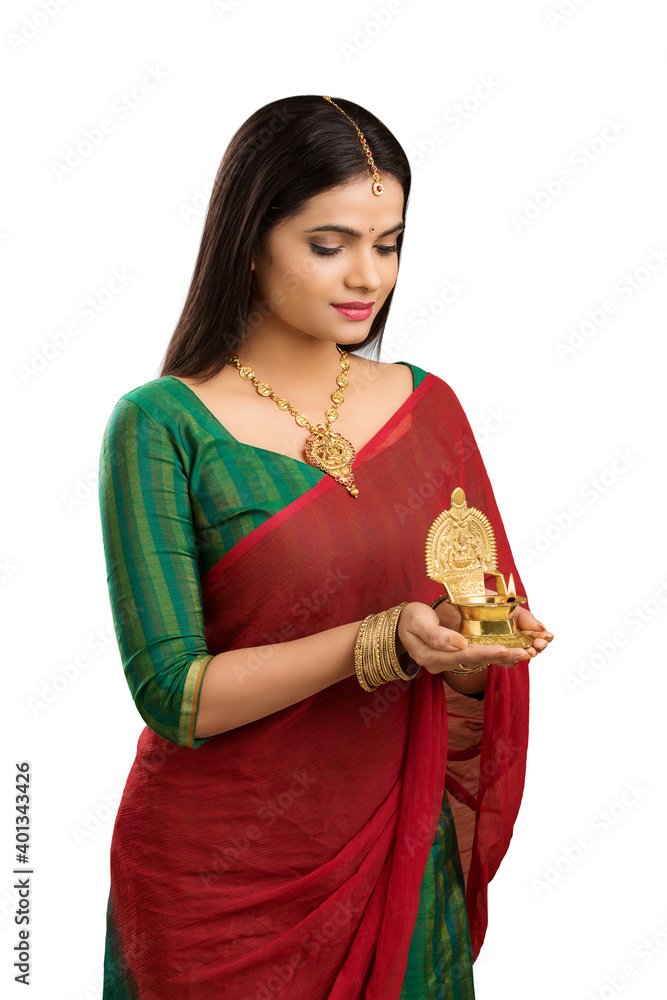 Hindu Indian young women holding Deepam in hands. ( Kamatchi vilakku ...