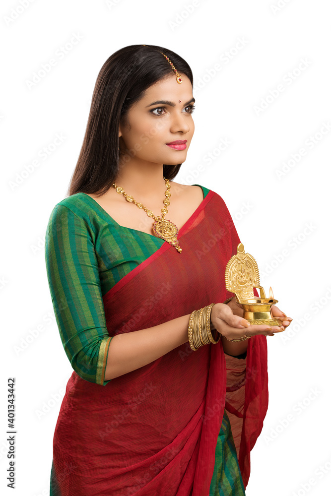 Hindu Indian young women holding Deepam in hands. ( Kamatchi vilakku ...