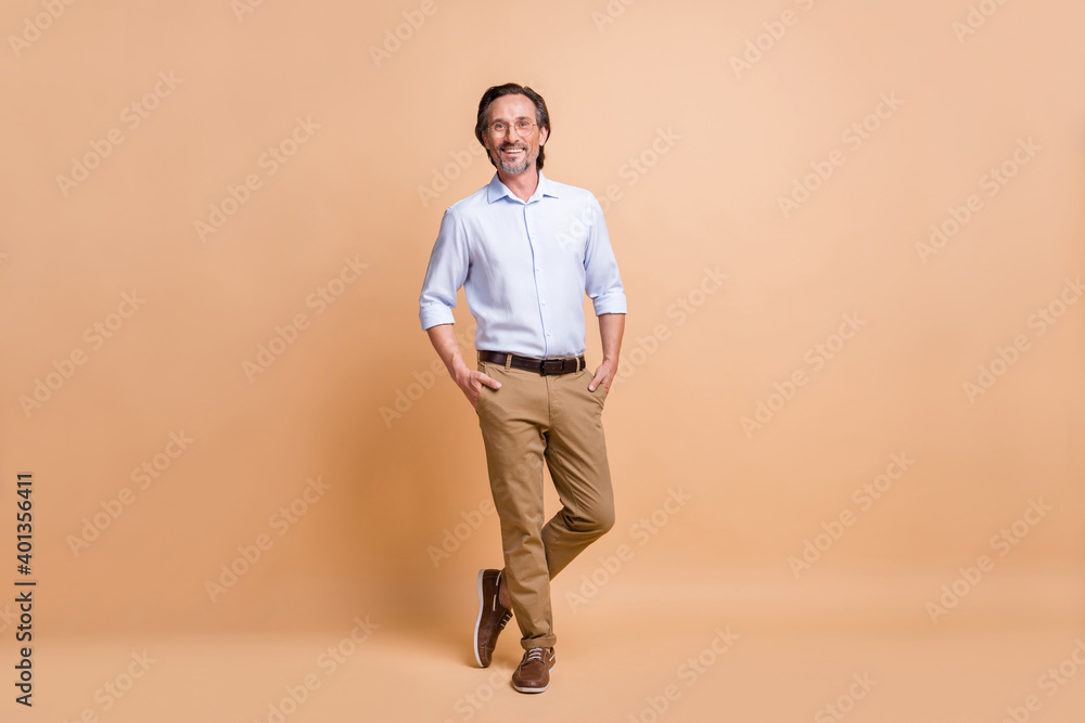Full length body size view of representative cheerful man holding hands ...
